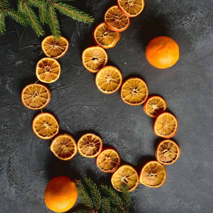 How to make a dried orange garland for Christmas decor - SimplyBeyondHerbs