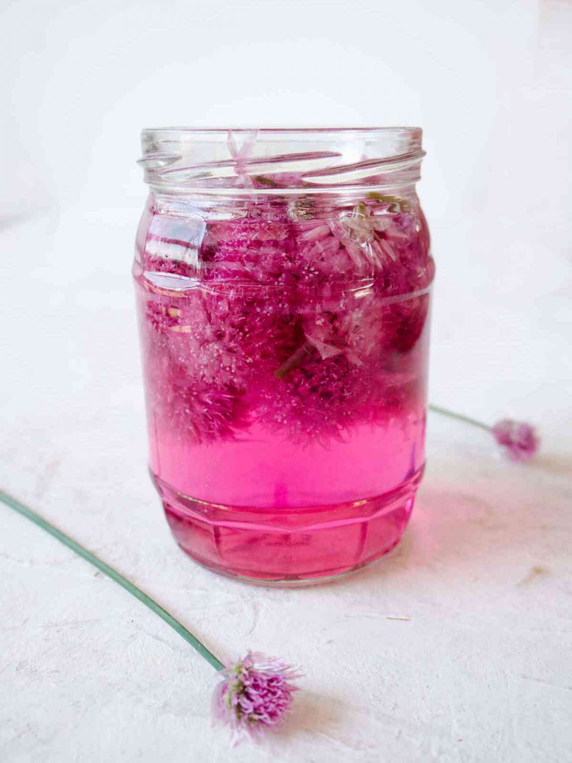 Make Chive Blossom Vinegar infusion. - SimplyBeyondHerbs